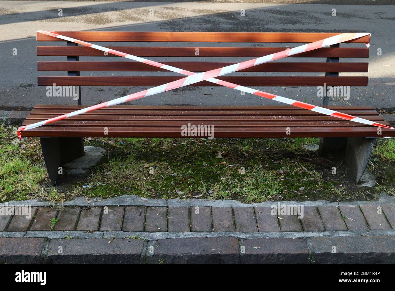 Bench, sitting prohibited, social distancing Stock Photo - Alamy
