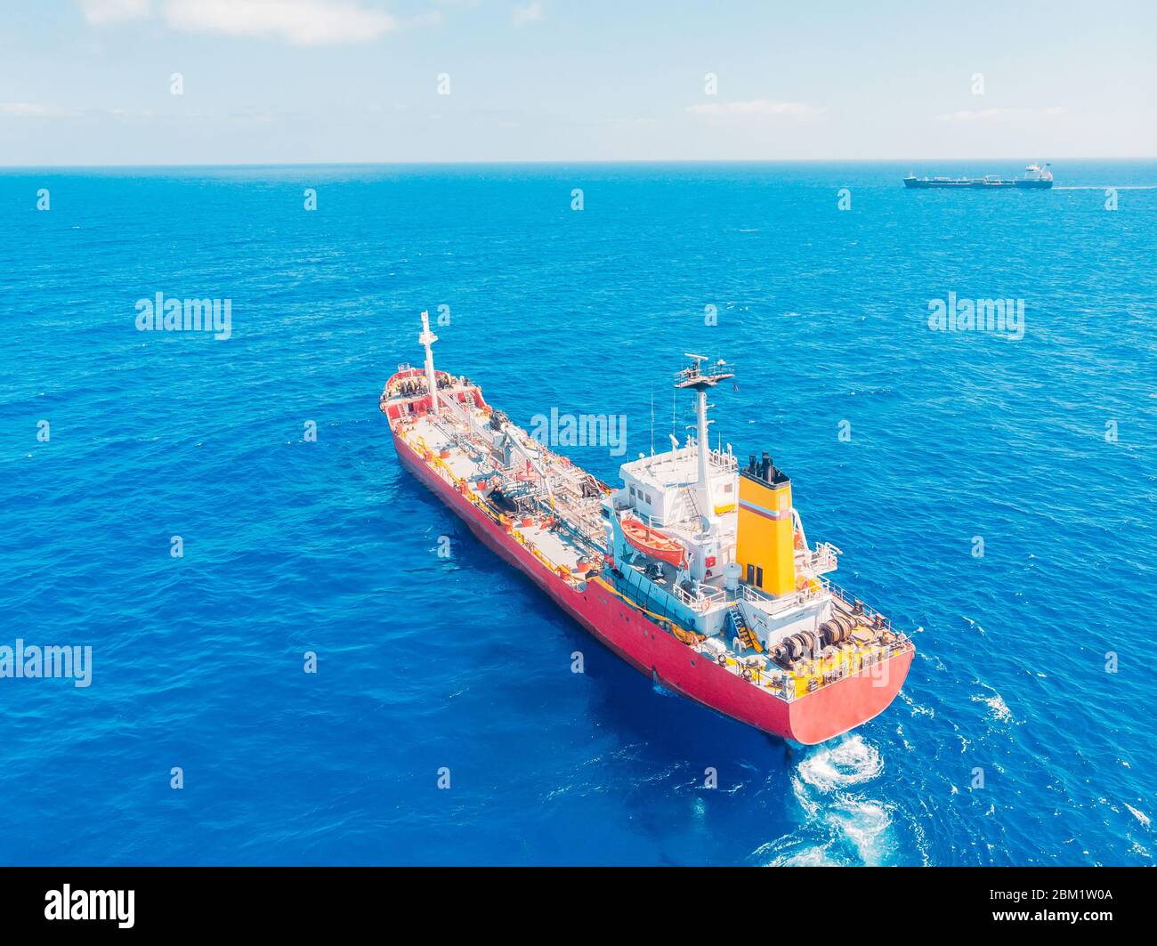 Oil ship chemical tanker sails blue sea. Aerial top view. Concept ...