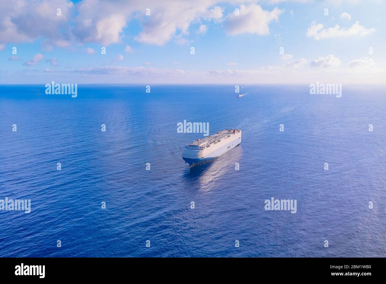 Carrier shipping out trade port blue sea Stock Photo - Alamy
