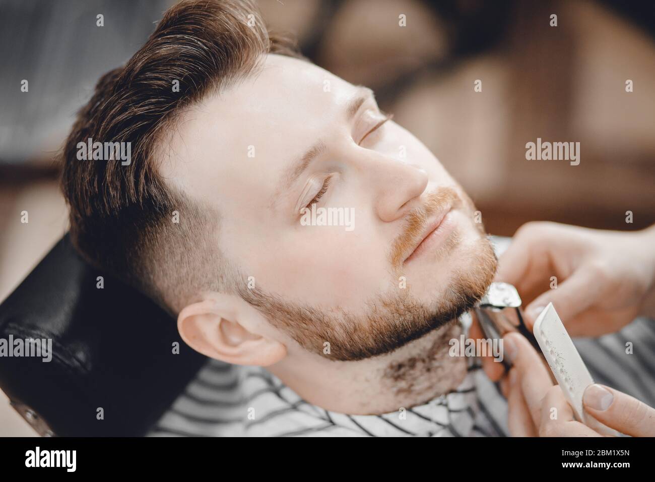 Mens haircut scissors in the barber shop hi-res stock photography and ...