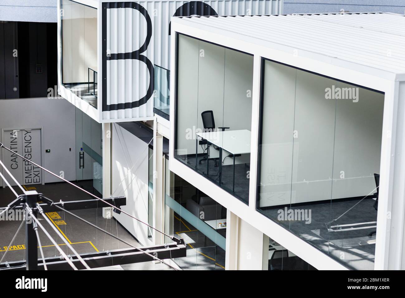 Modern big open space rental office for IT corporation Stock Photo - Alamy