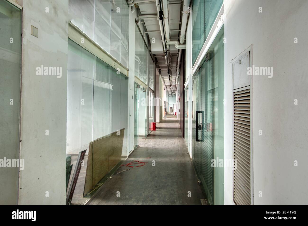 Interior corridor of a commercial office building Stock Photo - Alamy
