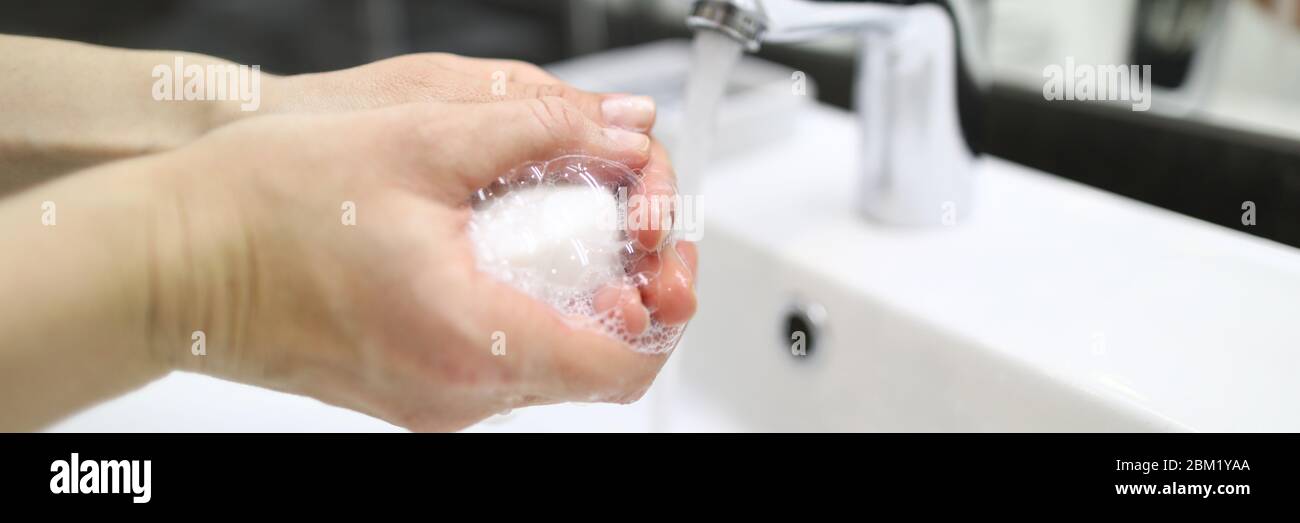 Man washes hands soap soap hi-res stock photography and images - Alamy