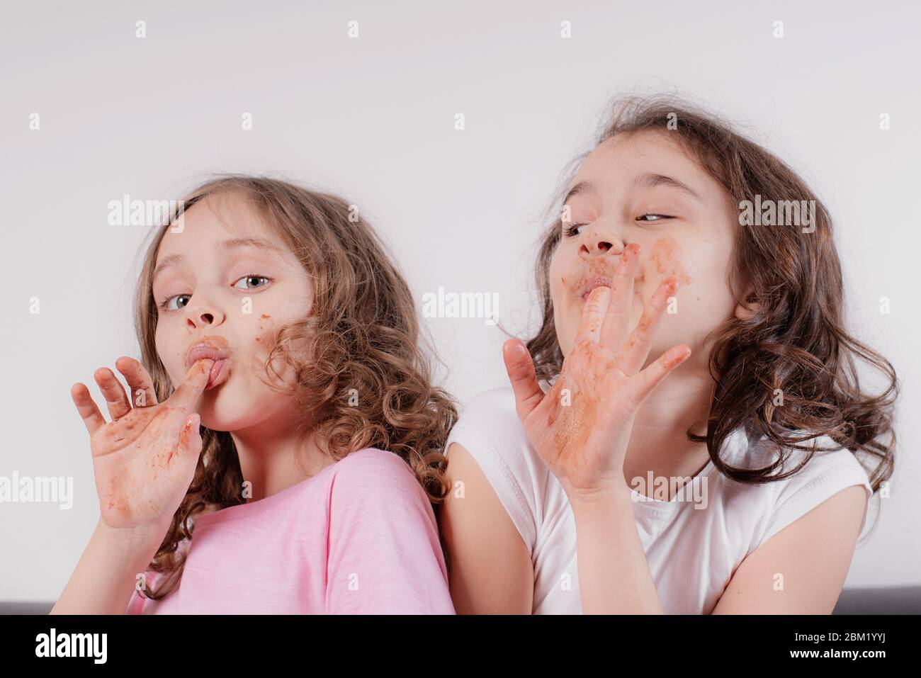 Messy chocolate eating with children hi-res stock photography and ...