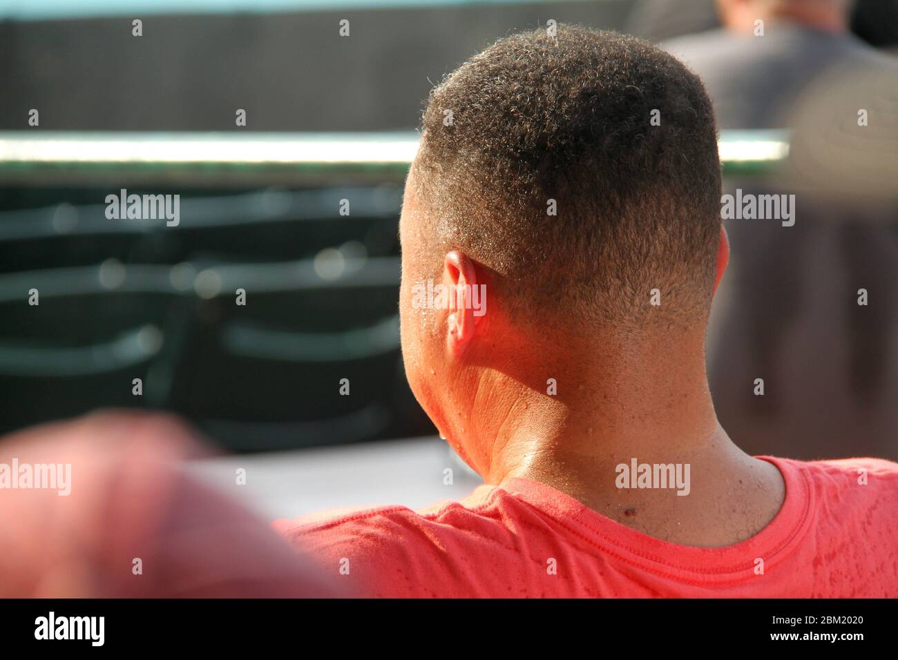 Man sweating in the sun Stock Photo - Alamy