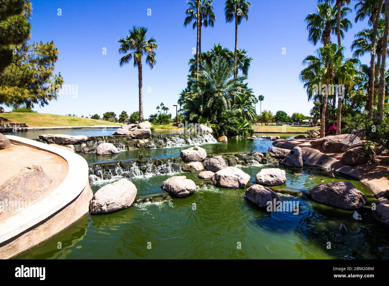 Small Ponds With Boulders In Public Park Stock Photo - Alamy