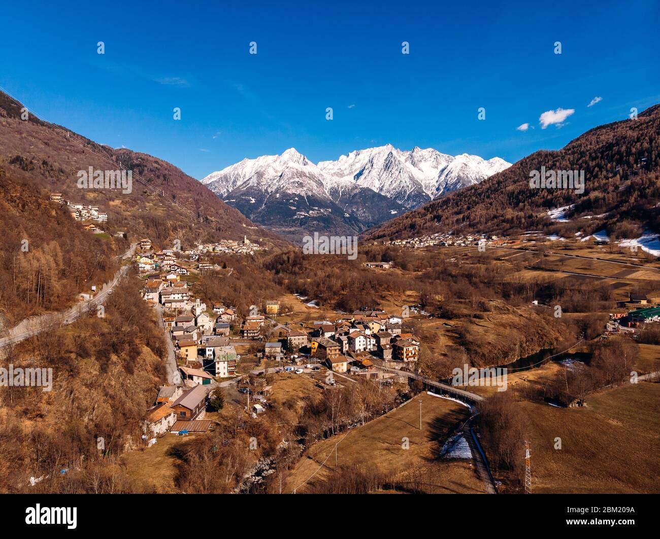 Aerial top view Mountain village with lift in Italy Alps Stock Photo ...