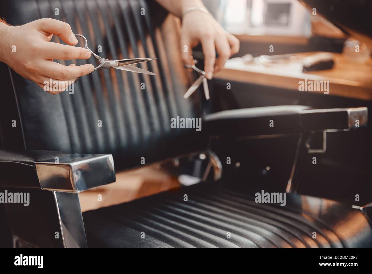 Close-up of barber holds clip-on hair clipper barbershop Stock Photo ...