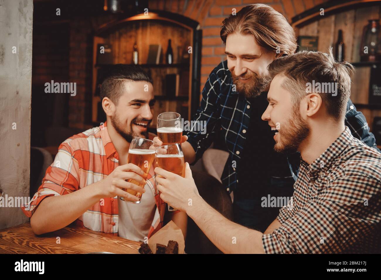 Group of friends enjoying drink pub nightclub. Concept friendship Stock ...