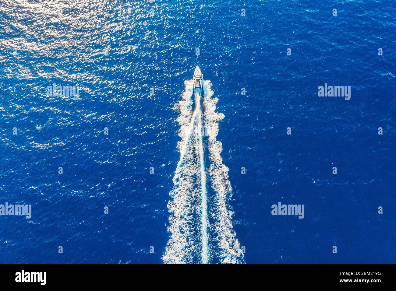 Speed boat in motion. Summer leisure time activity. Aerial top view ...