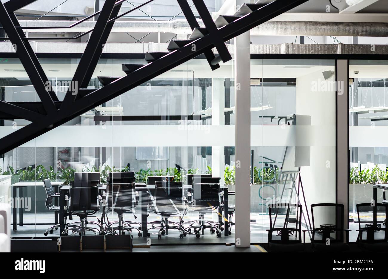 Open space office with transparent glass walls, loft interior Stock ...