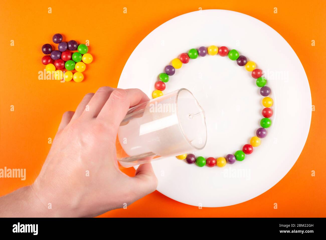 Rainbow swirl made from fruit-flavored colorful candy. Fun Science ...