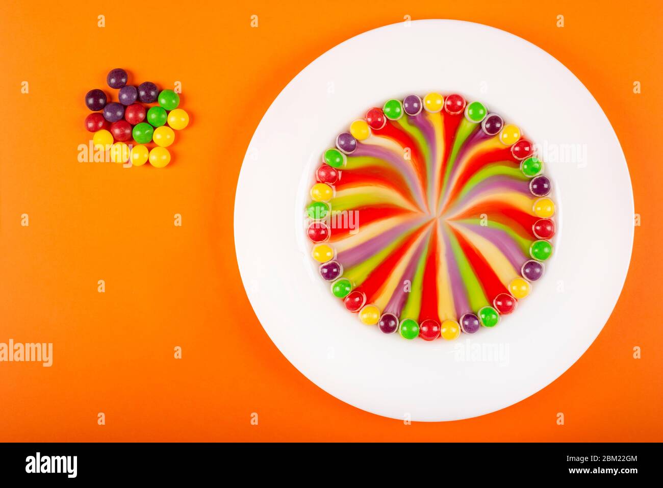 Rainbow swirl made from fruit-flavored colorful candy. Fun Science ...