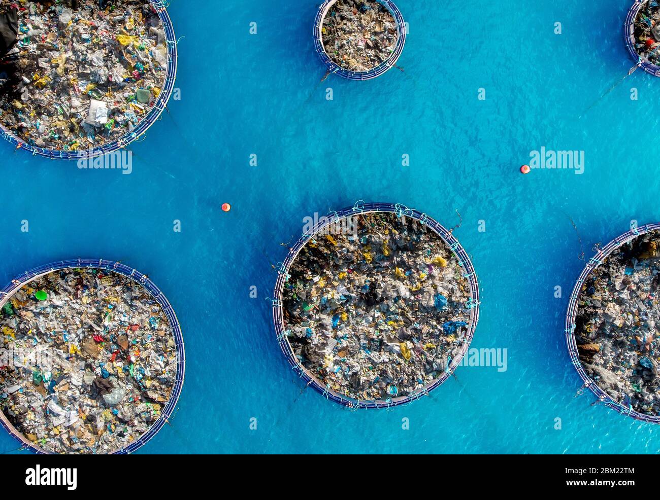 Concept cleaning ocean water from debris and plastic. Removing ...