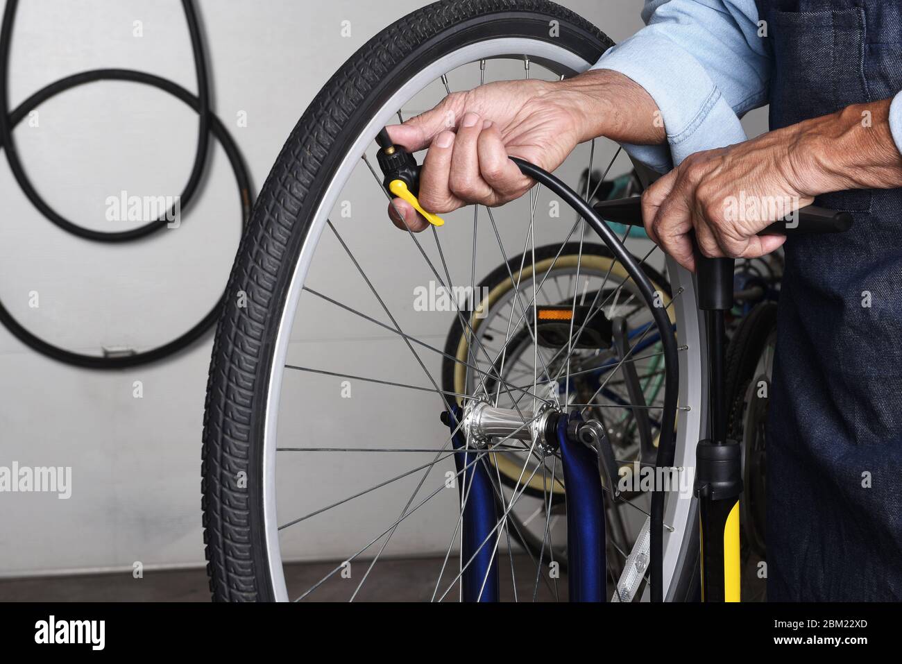 Pumping up bicycle wheel hi-res stock photography and images - Alamy