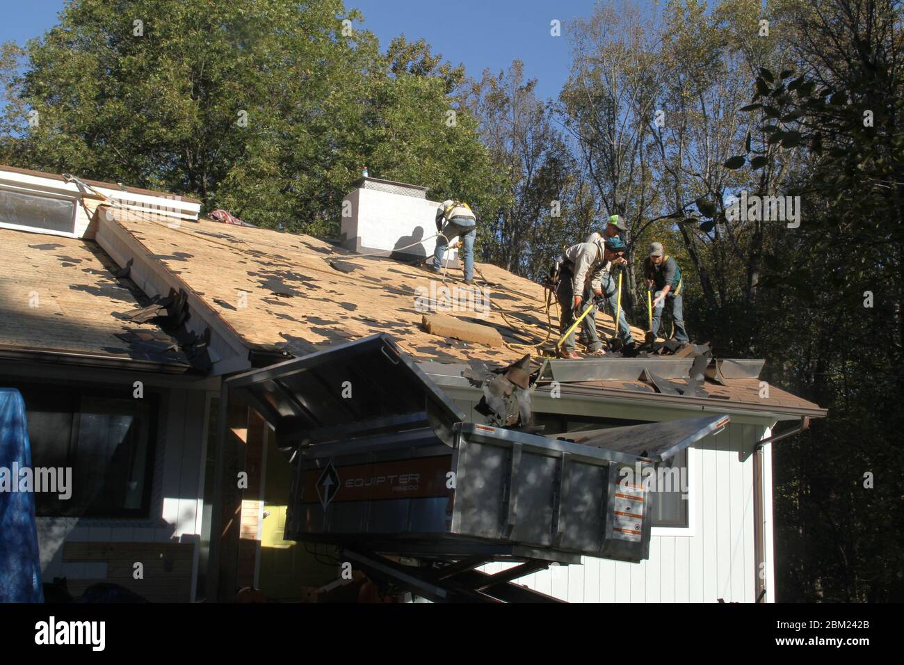 Removing old shingles hi-res stock photography and images - Alamy
