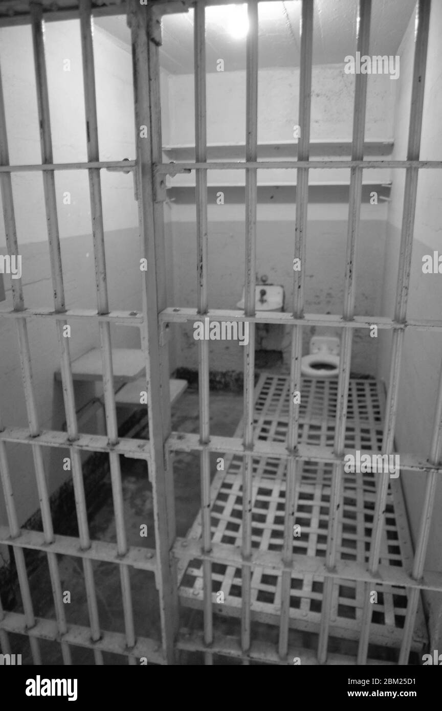 Metal bed and toilet in Cell Alcatraz San Francisco USA door entrance ...