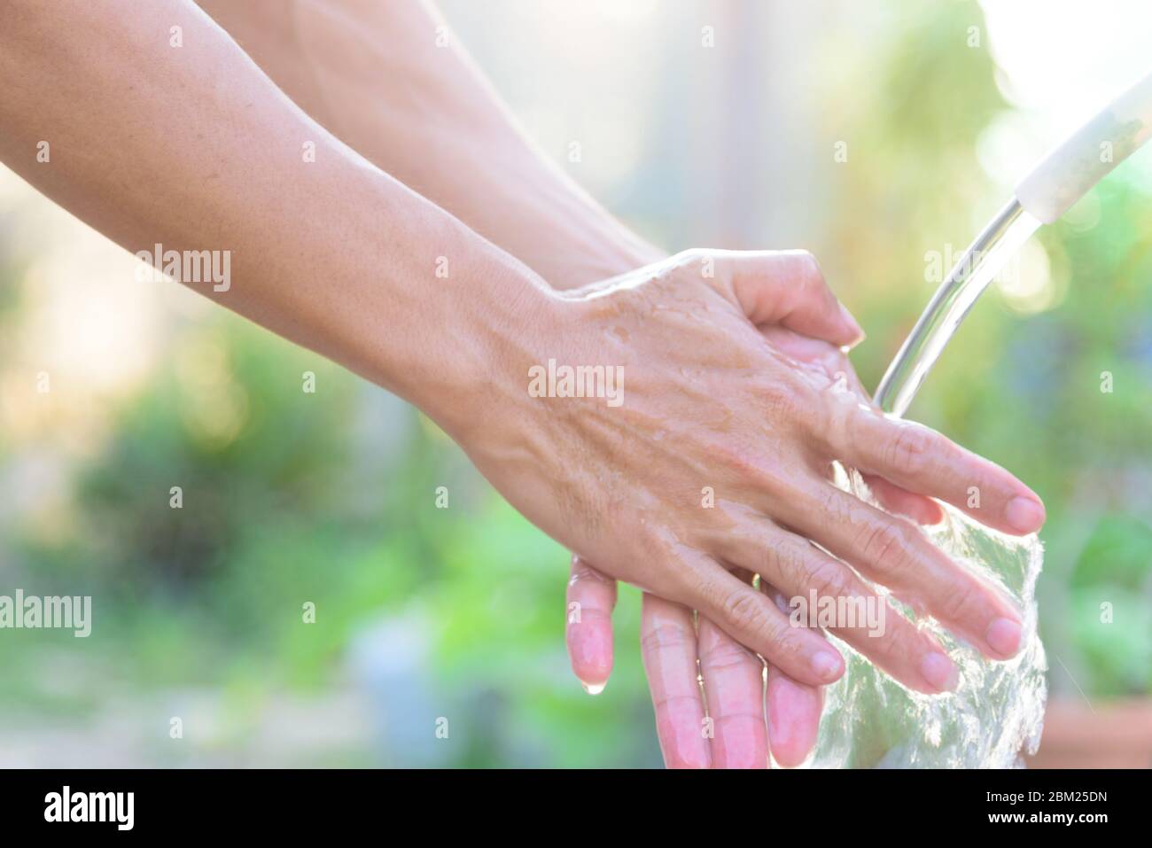 Hand wash in restroom Stock Photo - Alamy
