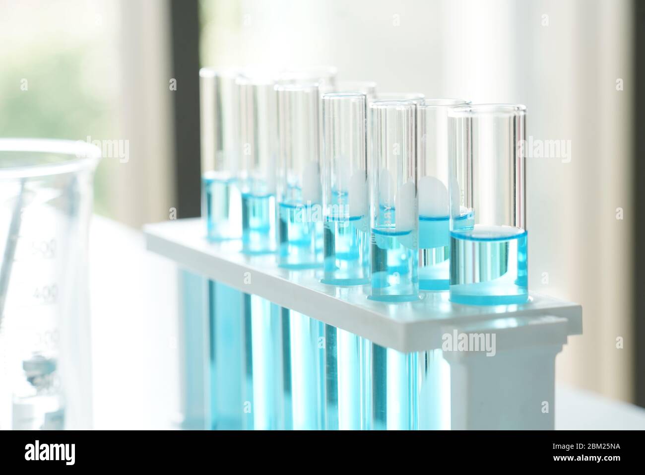 Research Test tube in scientist in laboratory, chemical liquid to test ...