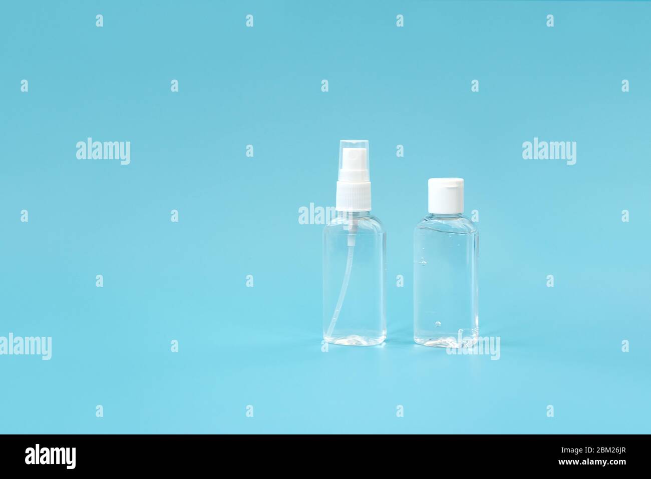 Set of antiseptic items. Bottles of antiseptic hand gel and spray on ...