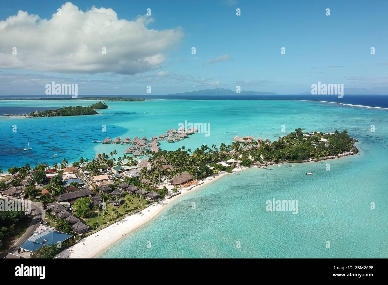 Matira point's overwater bungalows in Bora Bora Stock Photo - Alamy