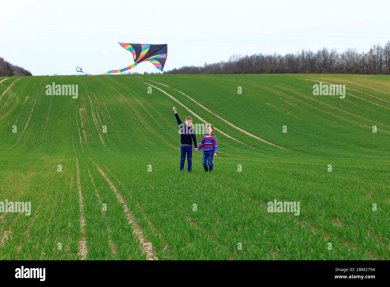 Children kite sea hi-res stock photography and images - Alamy