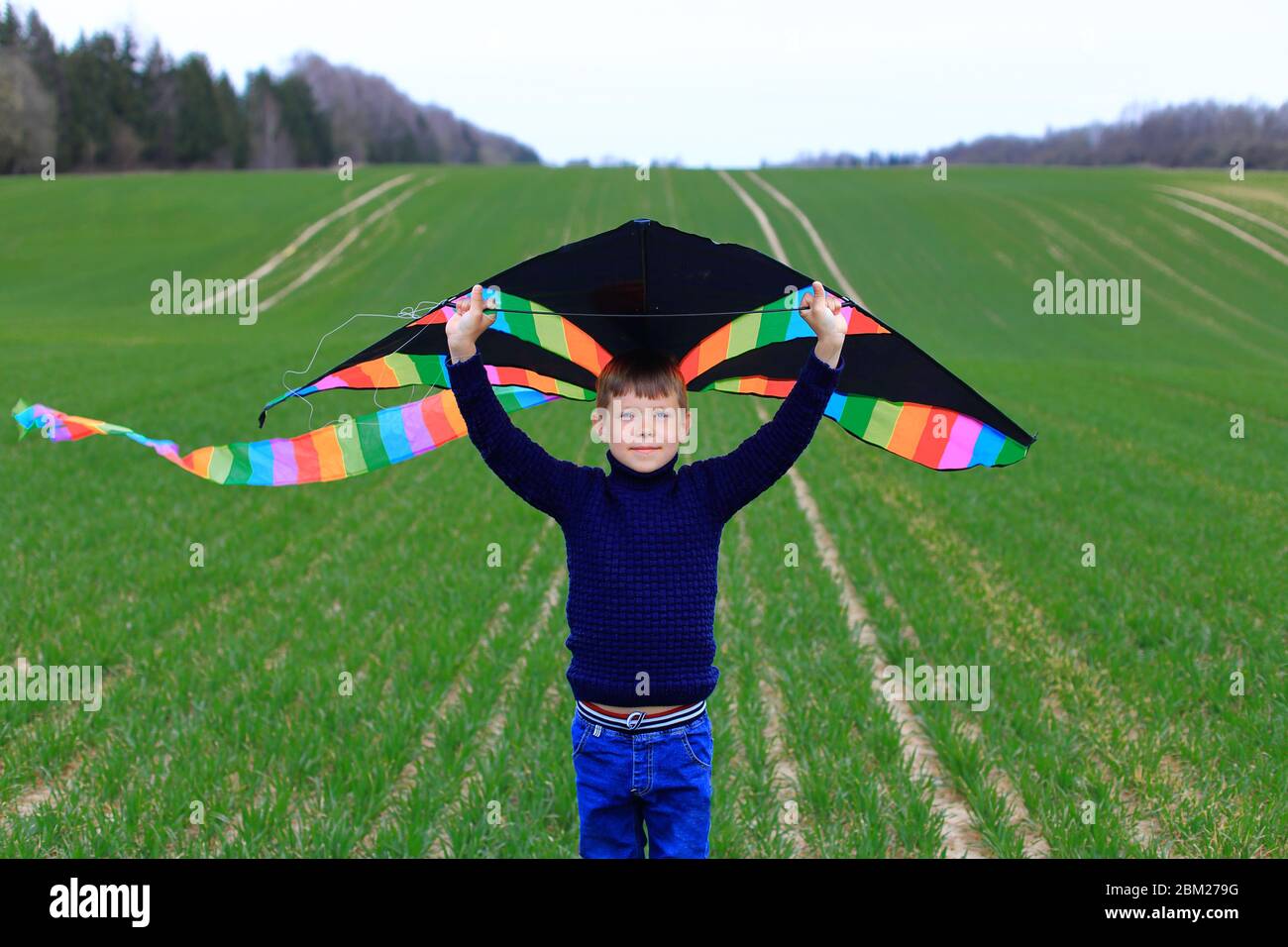 Boy with kite fly hi-res stock photography and images - Alamy