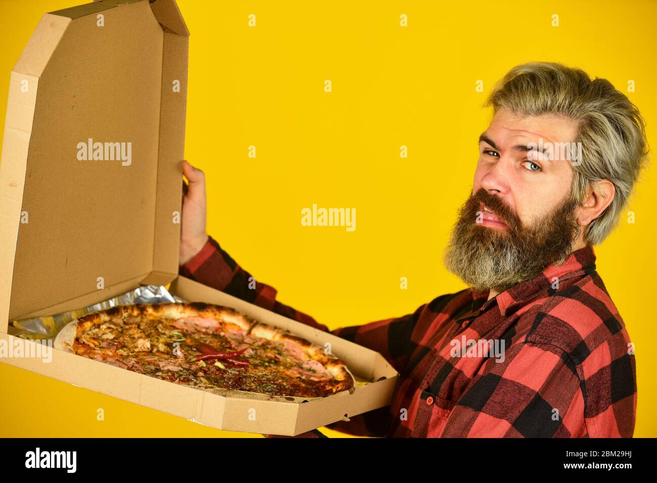 italian food. italy is here. bearded male chef cook or baker man. Hold ...