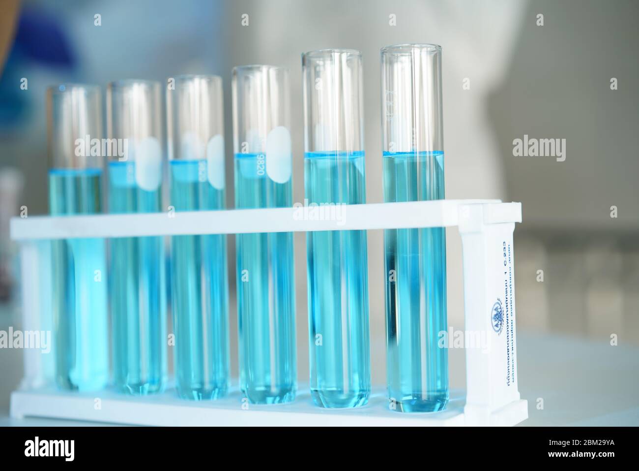 Research Test tube in scientist in laboratory, chemical liquid to test ...