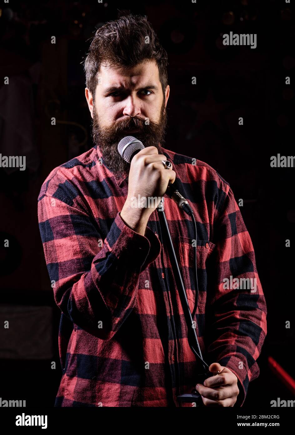 Musician, singer makes effort to win musical contest. Musician with ...