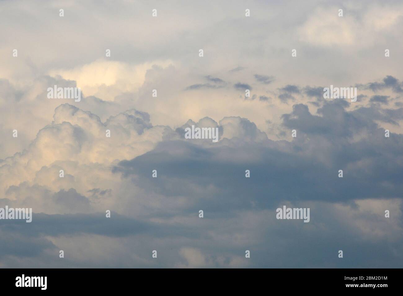 Photo of group of fluffy cloud in sky Stock Photo - Alamy