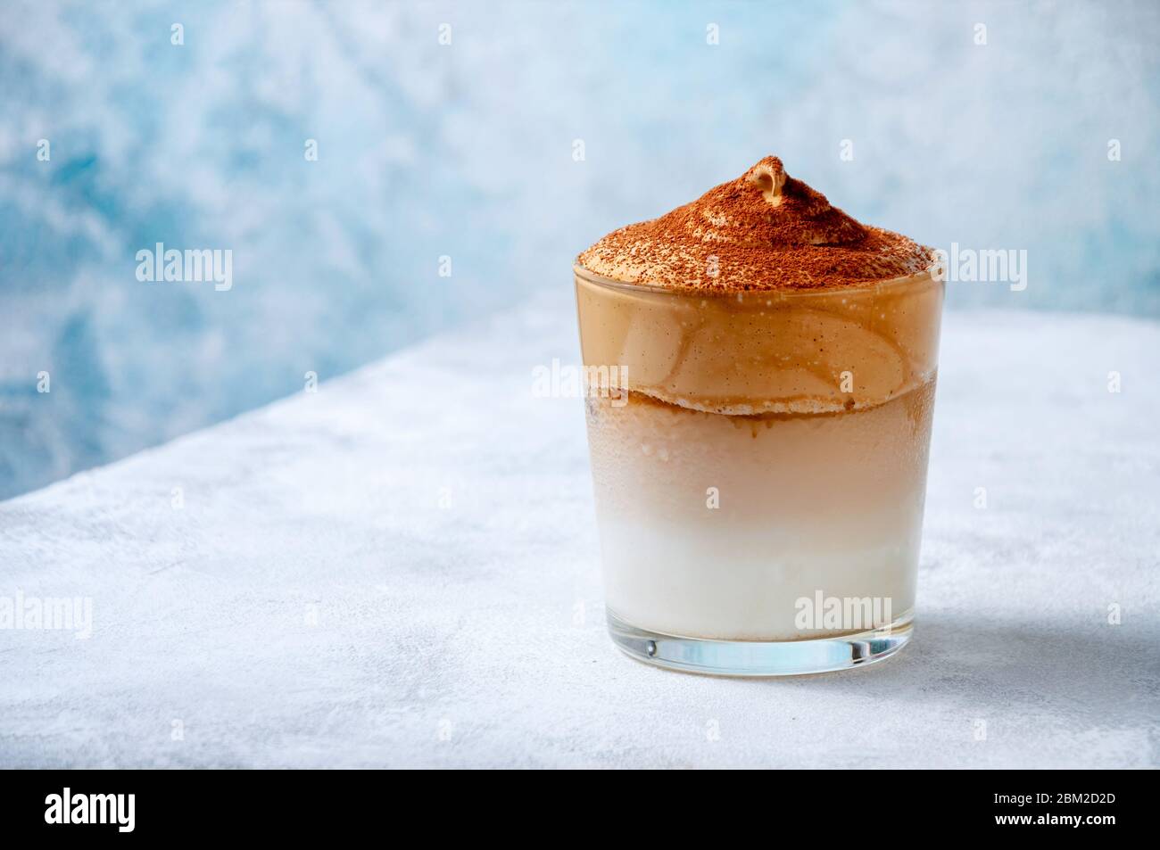 Iced Dalgona Coffee on Ligrht Background. Trendy Creamy Whipped Coffee ...