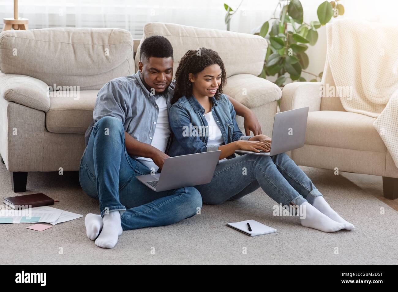 Couple laptops at home hi-res stock photography and images - Alamy