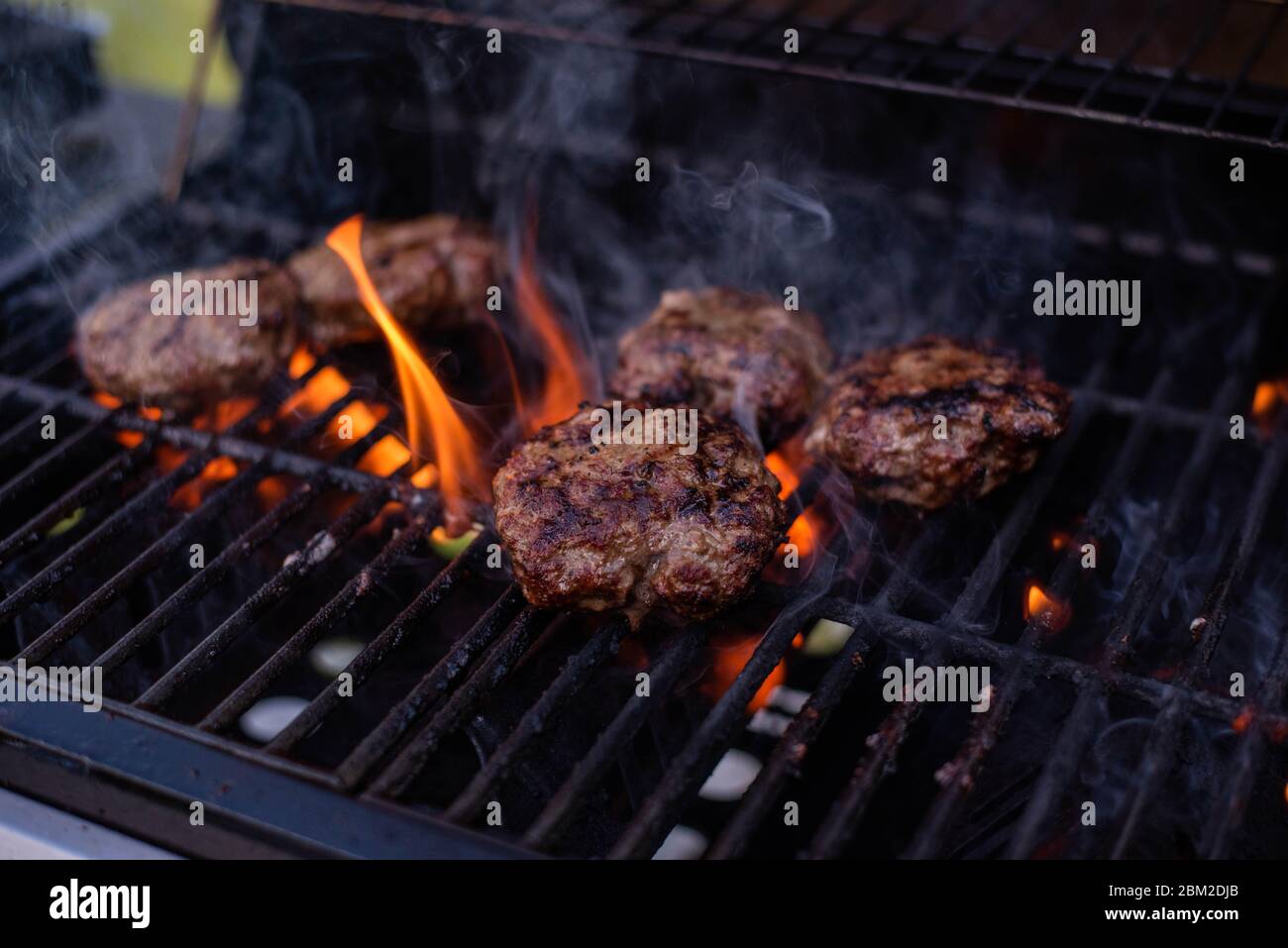 Flame broiled hamburgers hi-res stock photography and images - Alamy