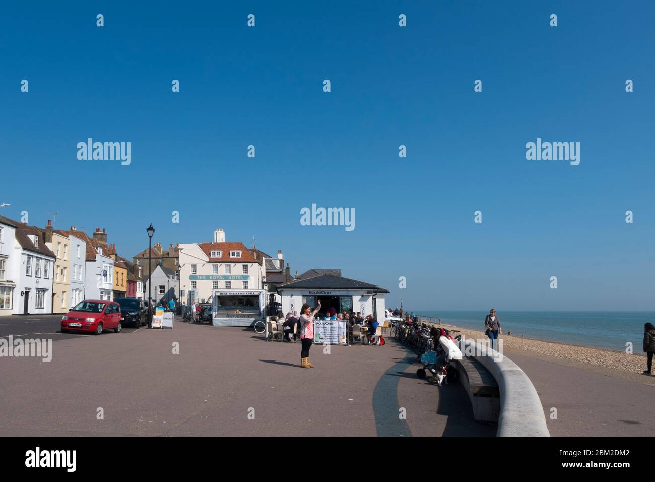 Holidaymakers outside the Route One Cafe on the prom taking photographs ...