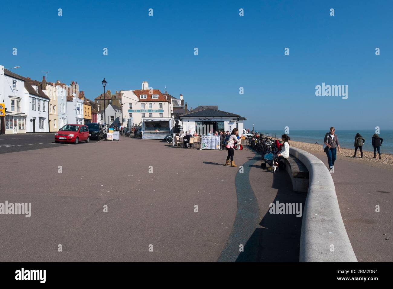 Holidaymakers outside the Route One Cafe on the prom taking photographs ...