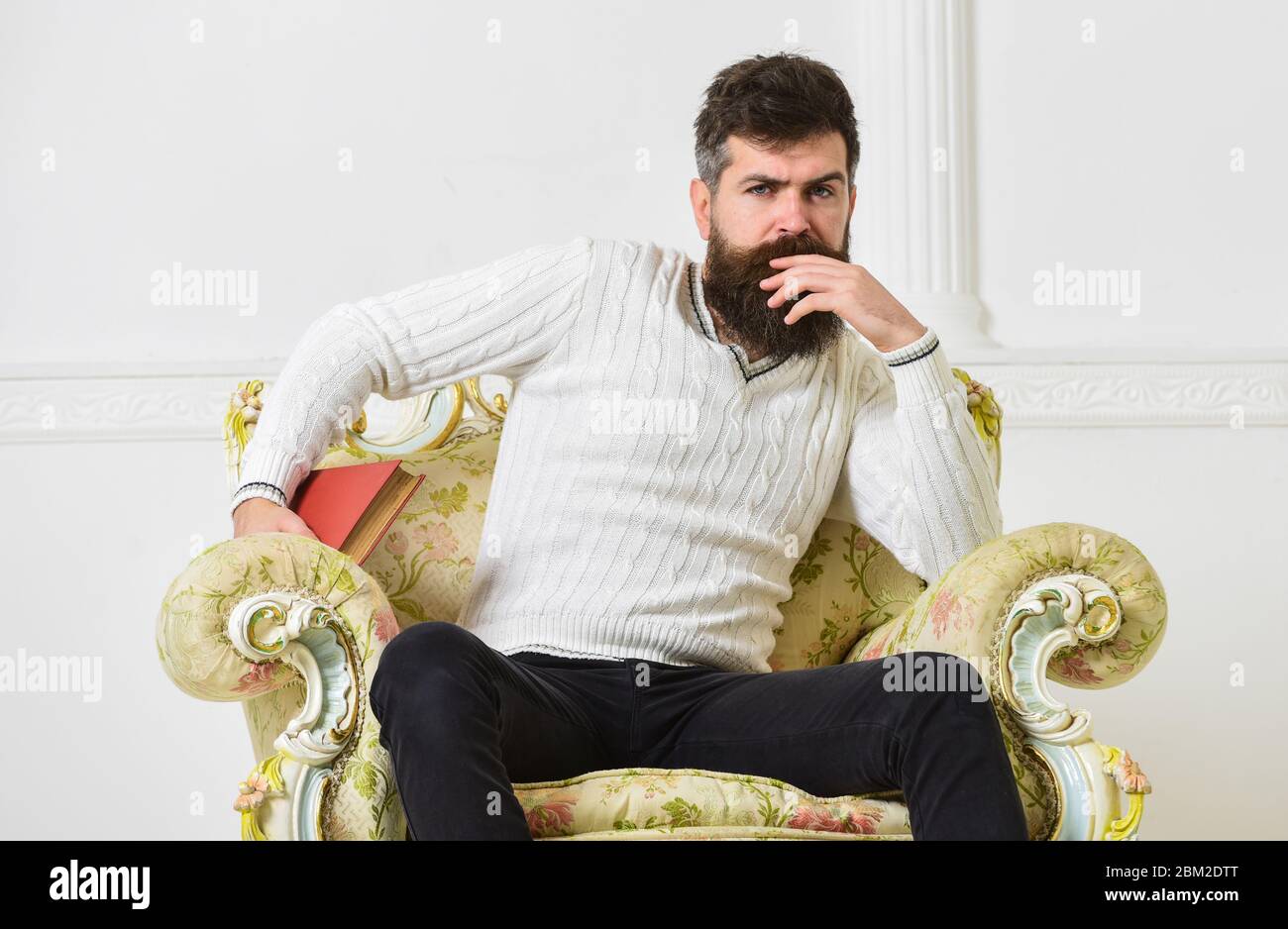 Connoisseur of literature concept. Macho spends leisure with book ...
