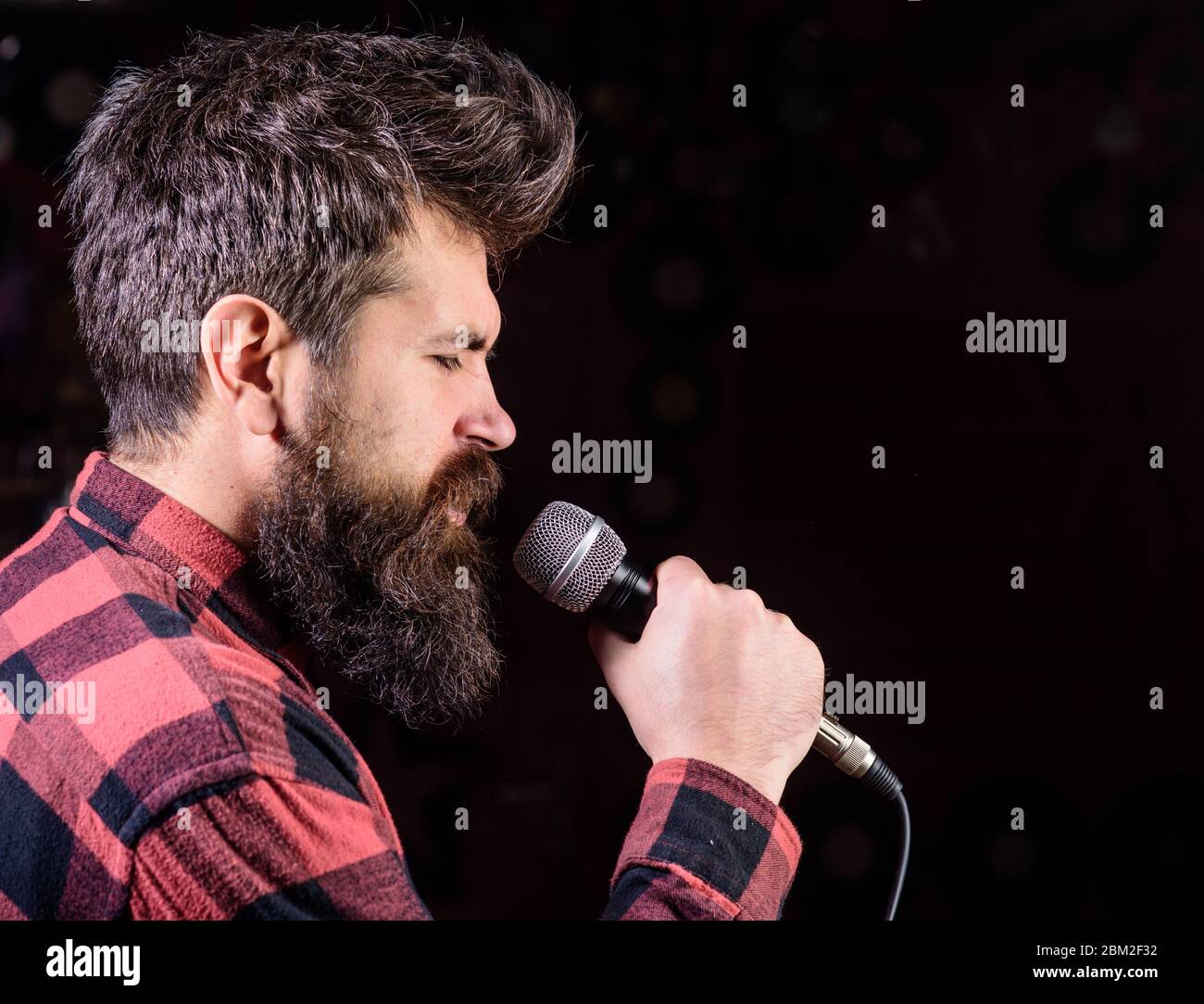 Talented vocalist concept. Musician, vocalist with beard and mustache ...