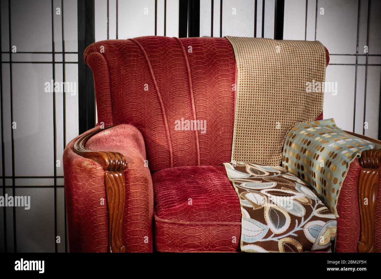 reupholster red arm chair comparison with different fabric Stock Photo ...