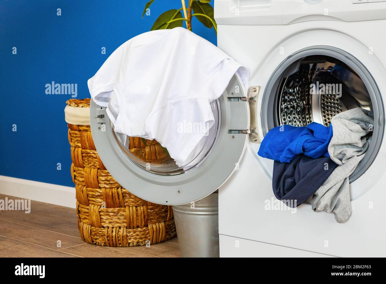 Laundry room. Close up of washing machine Stock Photo - Alamy
