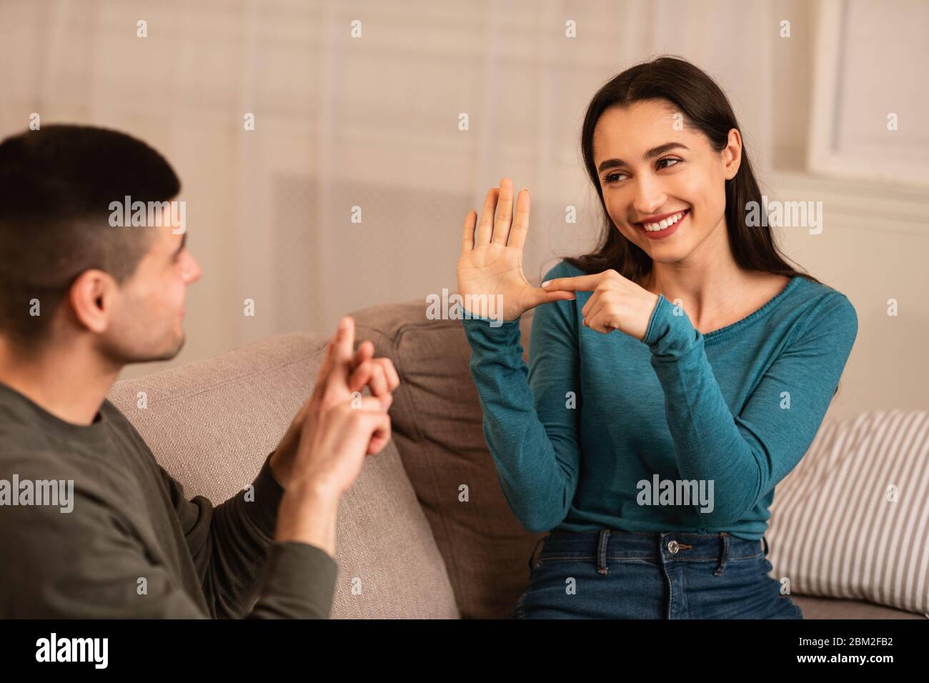 Deaf people talking hi-res stock photography and images - Alamy