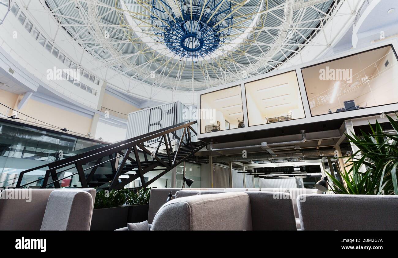 Big light hall in modern open space office with dome Stock Photo - Alamy