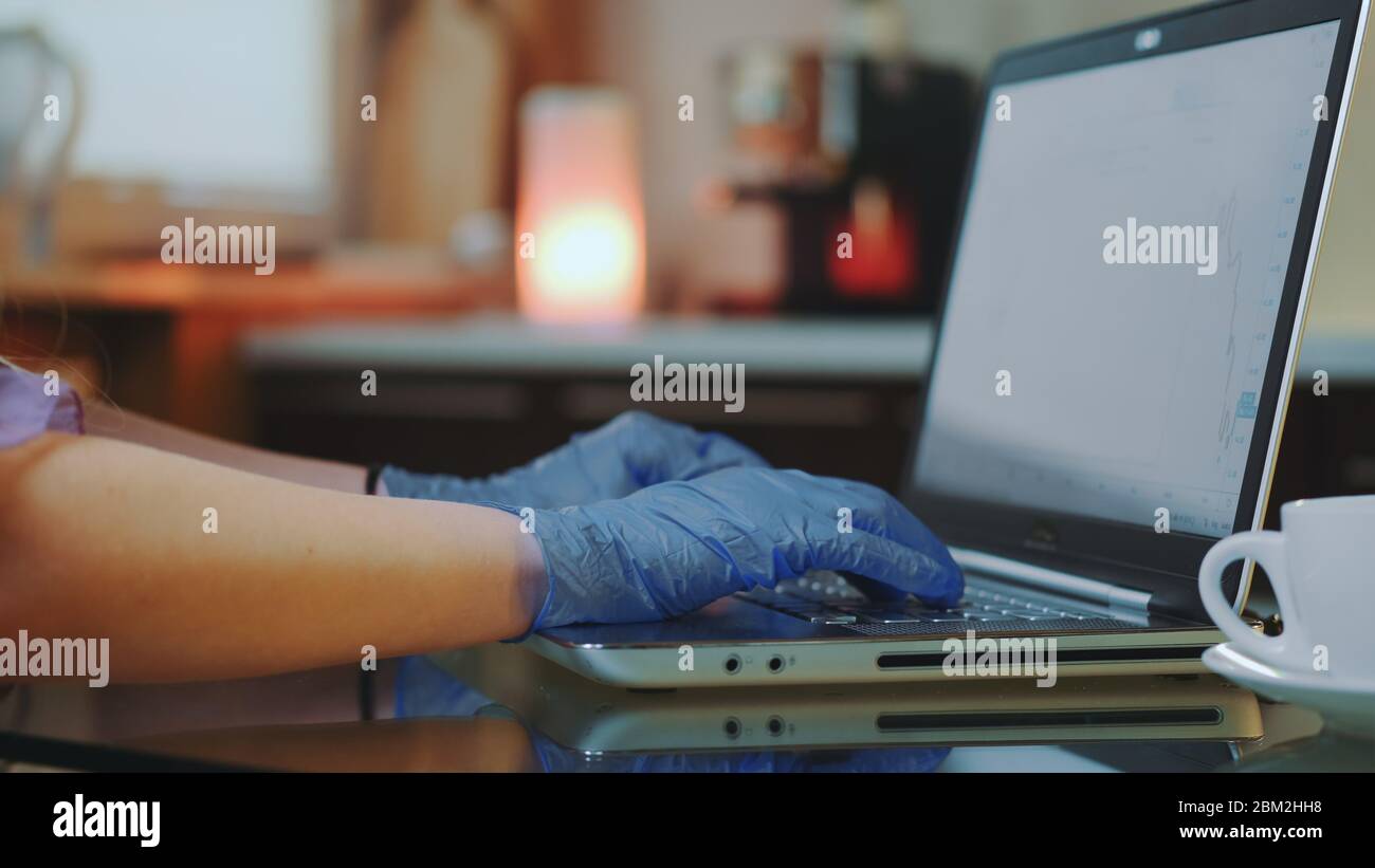 Computer keyboard hands gloves typing hi-res stock photography and ...