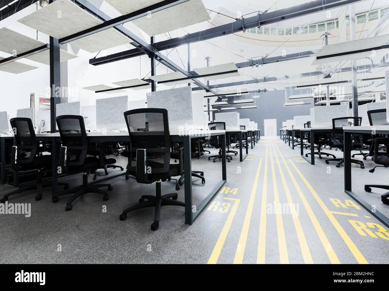 Modern office interior with wrapped in cover computer Stock Photo - Alamy