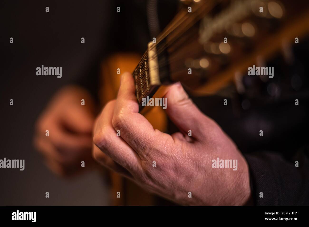 close up performer plays classical mandolin on stage Stock Photo - Alamy