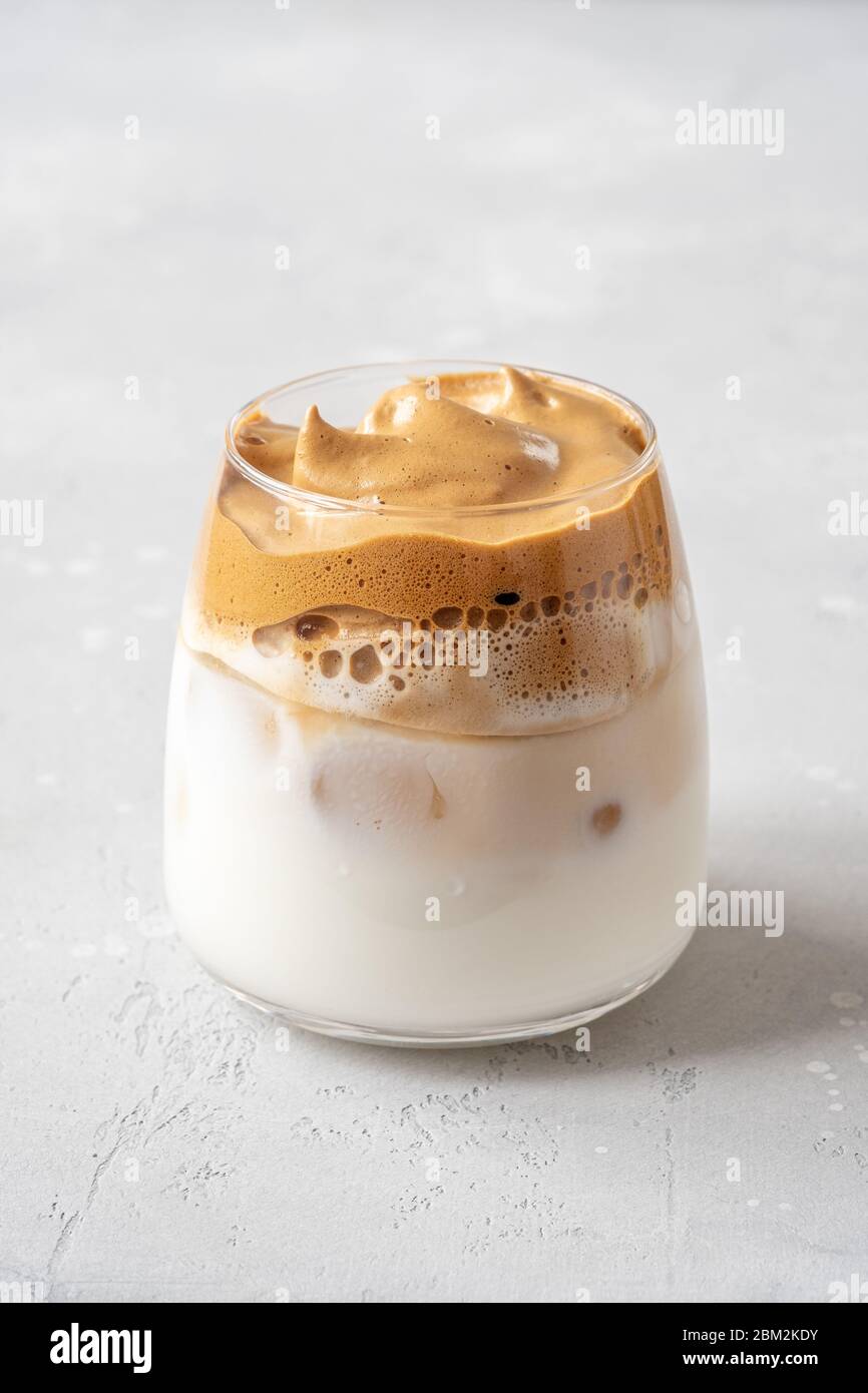 Iced Dalgona Coffee, a trendy fluffy creamy whipped coffee Stock Photo ...