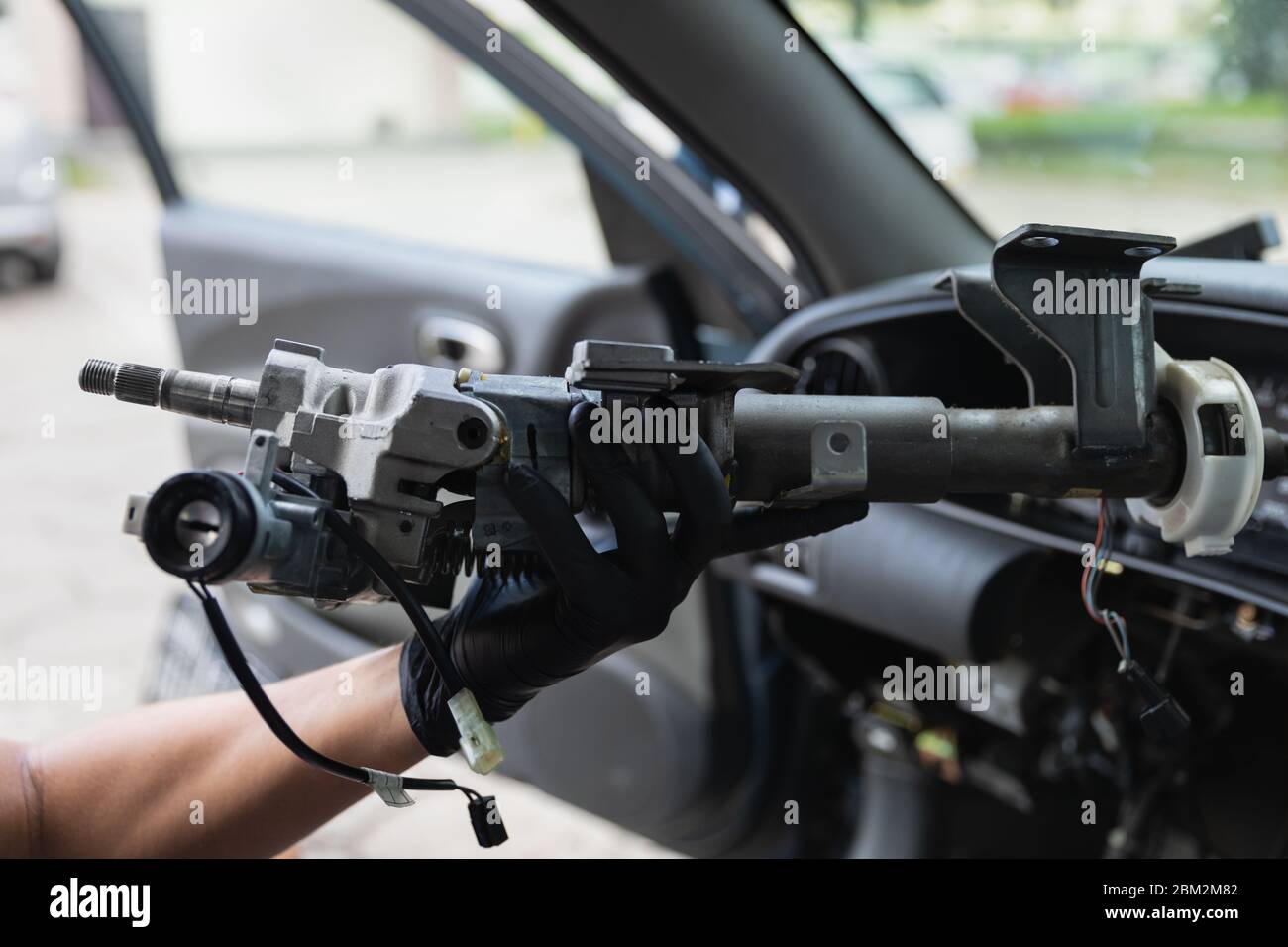 Close Up car steering wheel repair after the accident. Disconnecting of ...