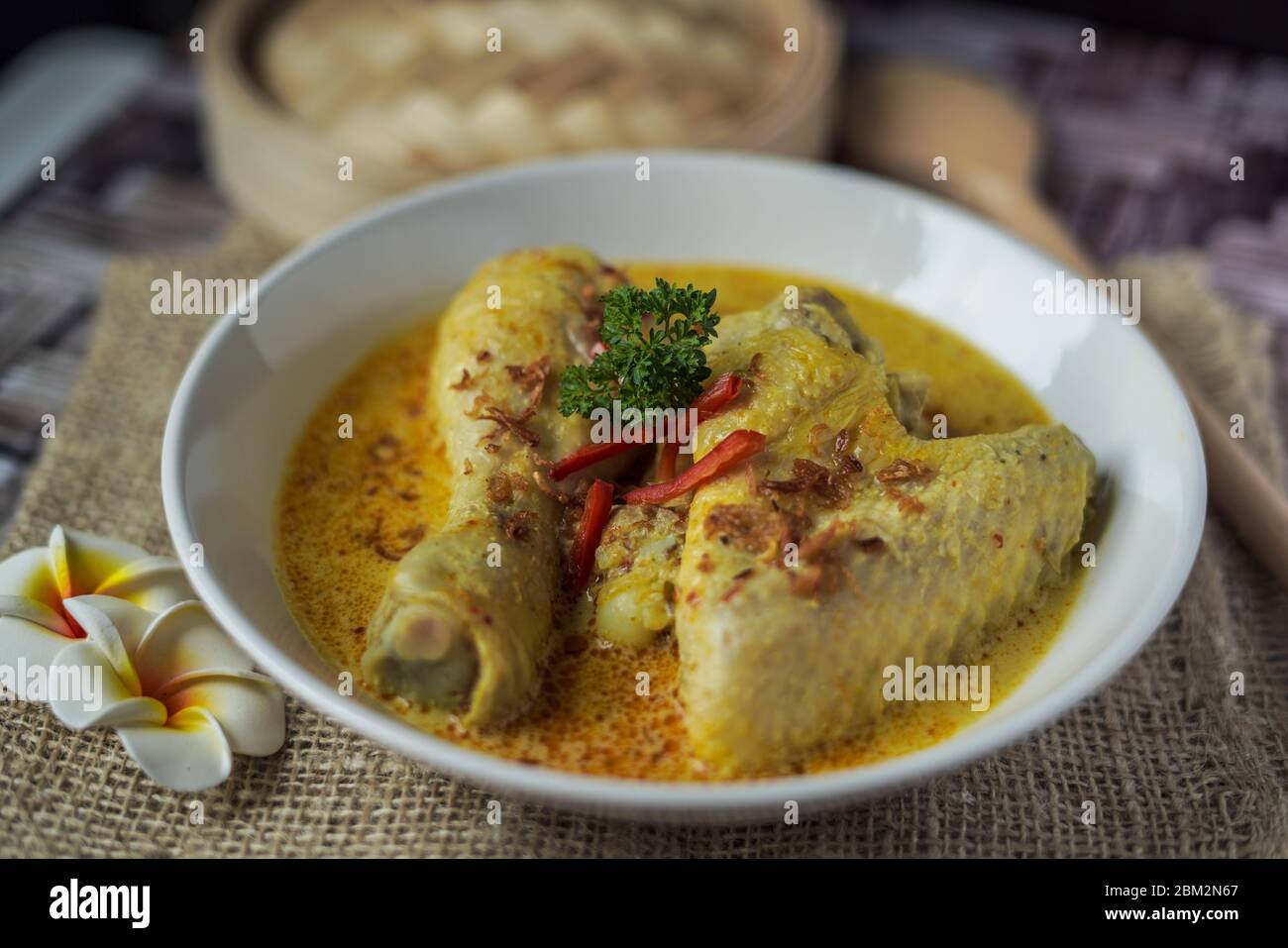 Opor Ayam (Indonesian Curry), Chicken cooked in coconut milk and spices ...