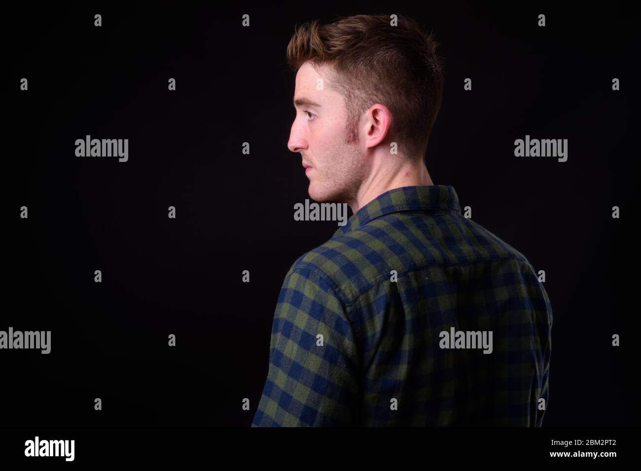 Rear side view young man hi-res stock photography and images - Alamy