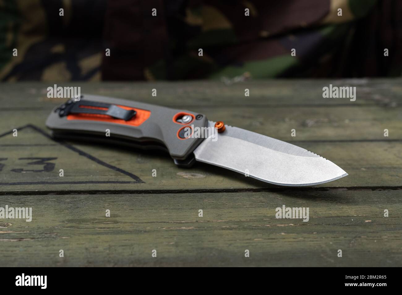 The reverse side of the knife. The knife is tilted. Knife with an ...